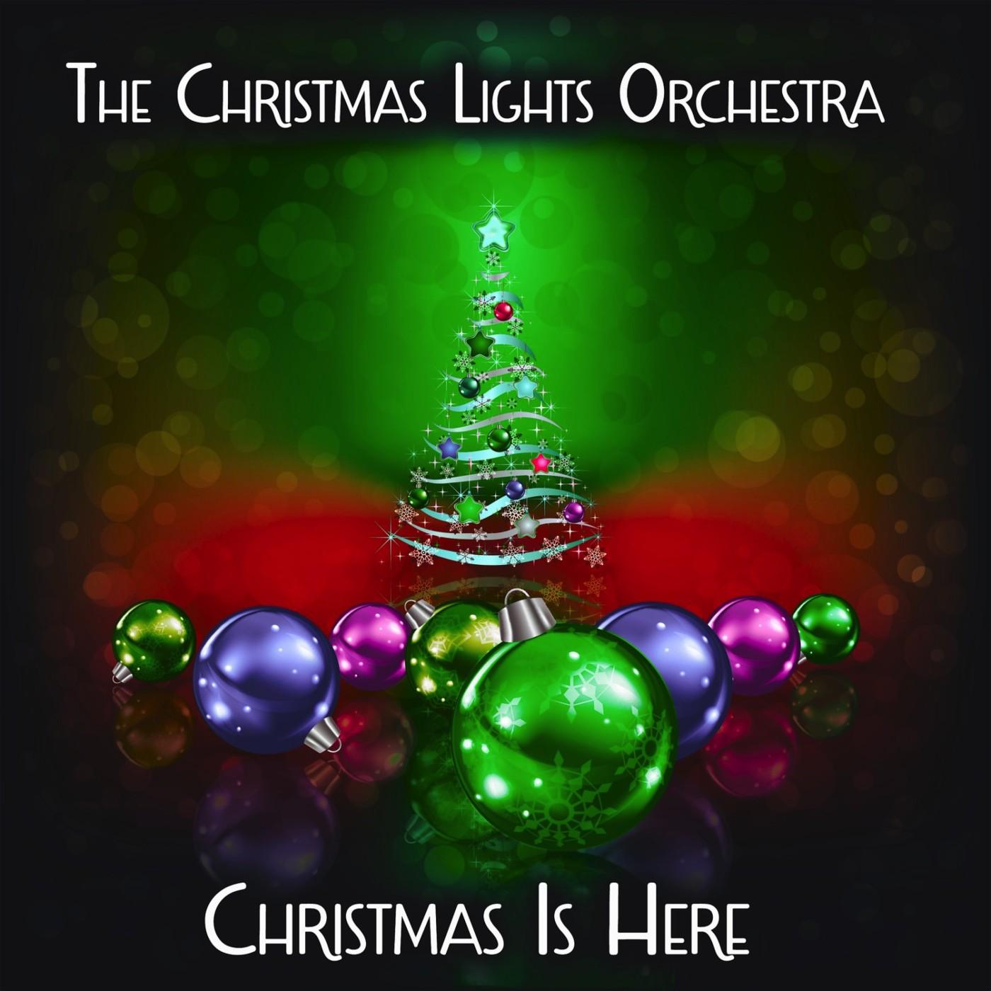 The Christmas Lights Orchestra - Christmas Is Here | iHeart